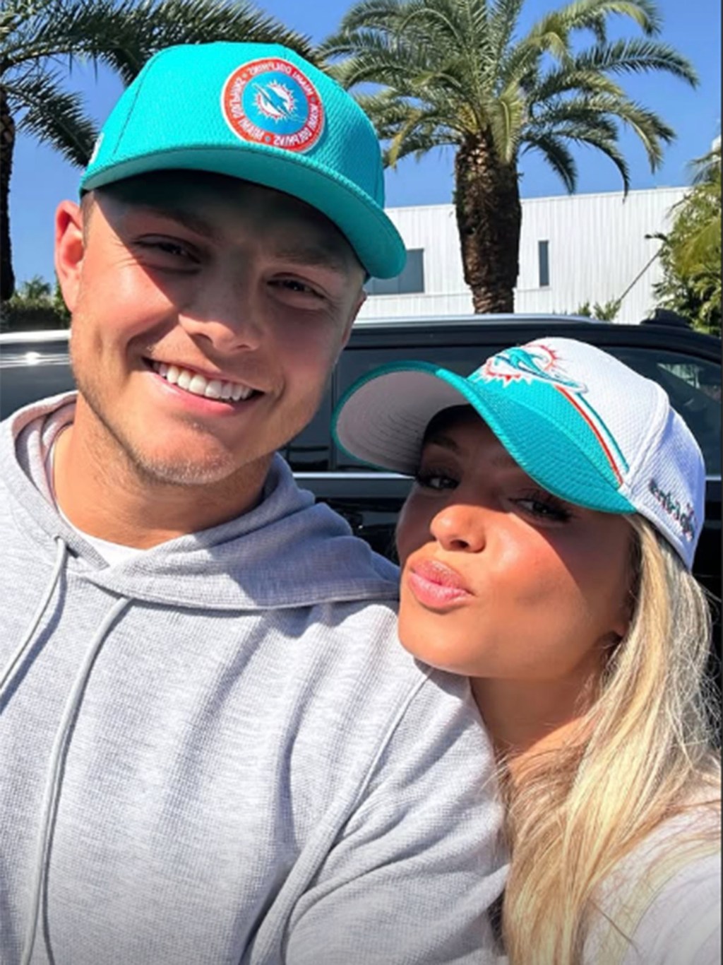 Zach Wilson joined by fiancée Nicolette Dellanno at Dolphins signing ...