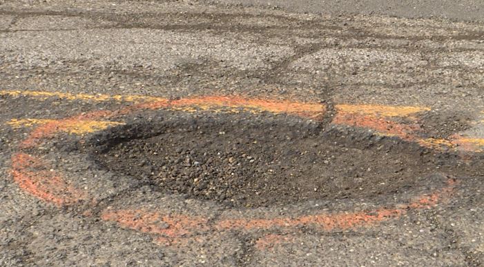 West Virginia Department of Highways is beginning to fill potholes in ...
