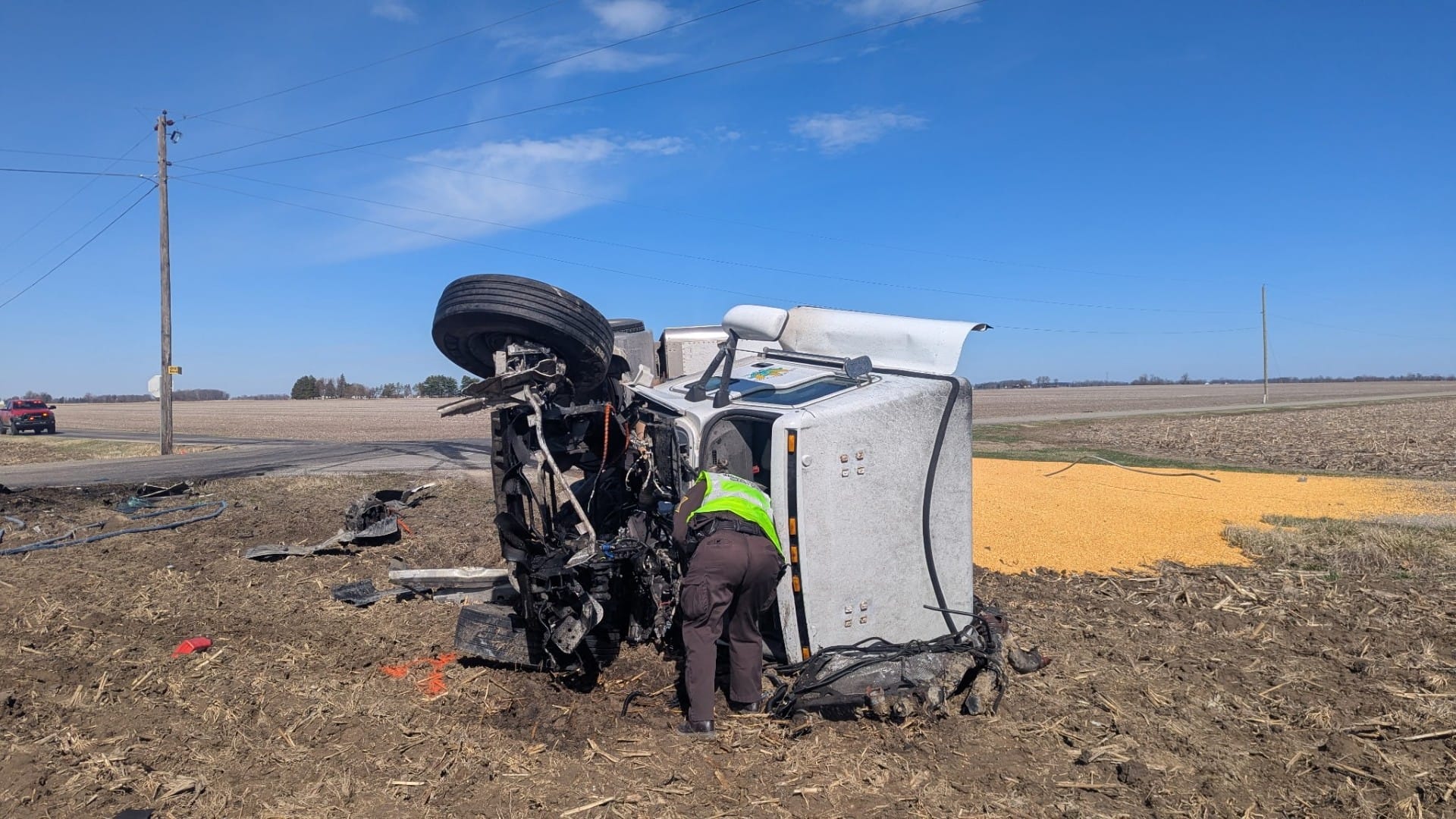 Semi hauling corn crashes into school bus in Madison County