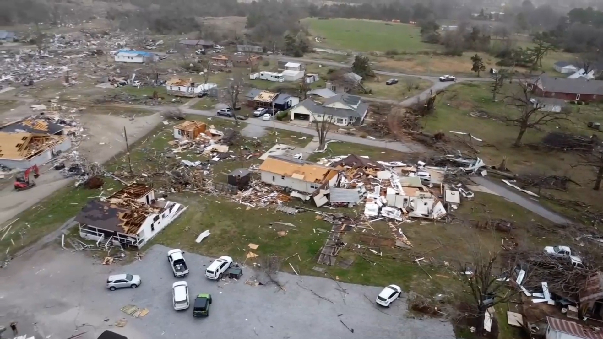 Homes flattened and trees down after tornado sweeps through Arkansas city