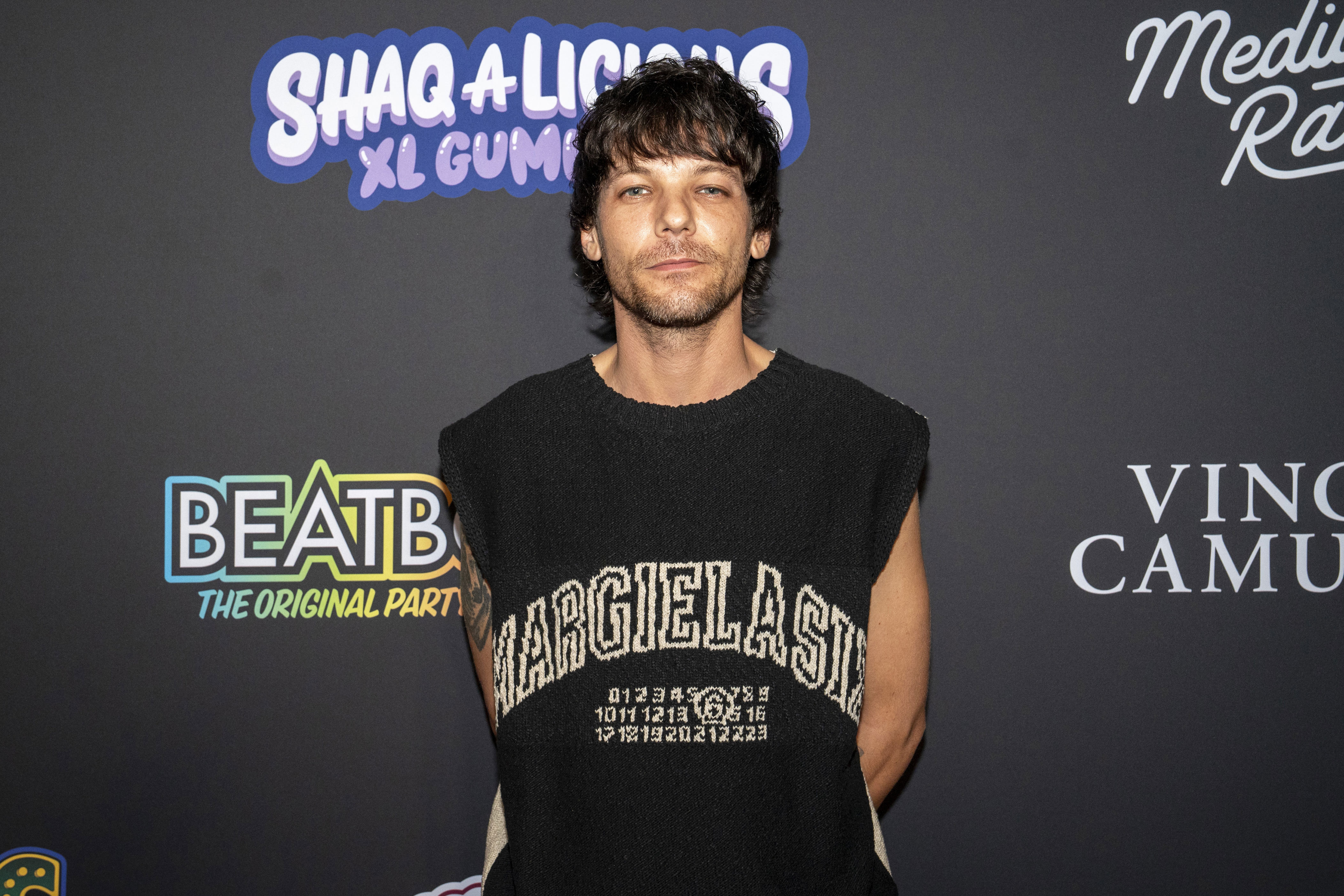 Louis Tomlinson shares 'brutal' challenge of looking back at One ...