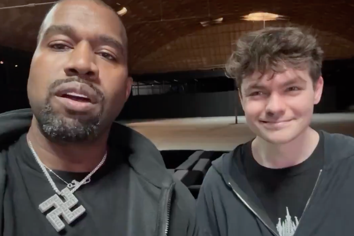 Kanye poses in swastika chain with white supremacist Nick Fuentes