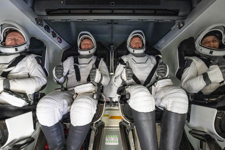 Nasa astronauts return to Earth smiling after nine months stuck in space