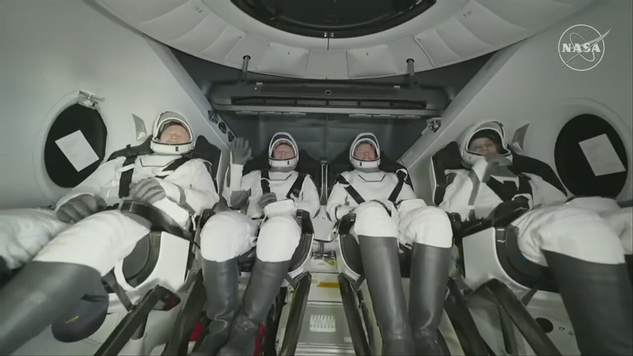 NASA astronauts leave capsule