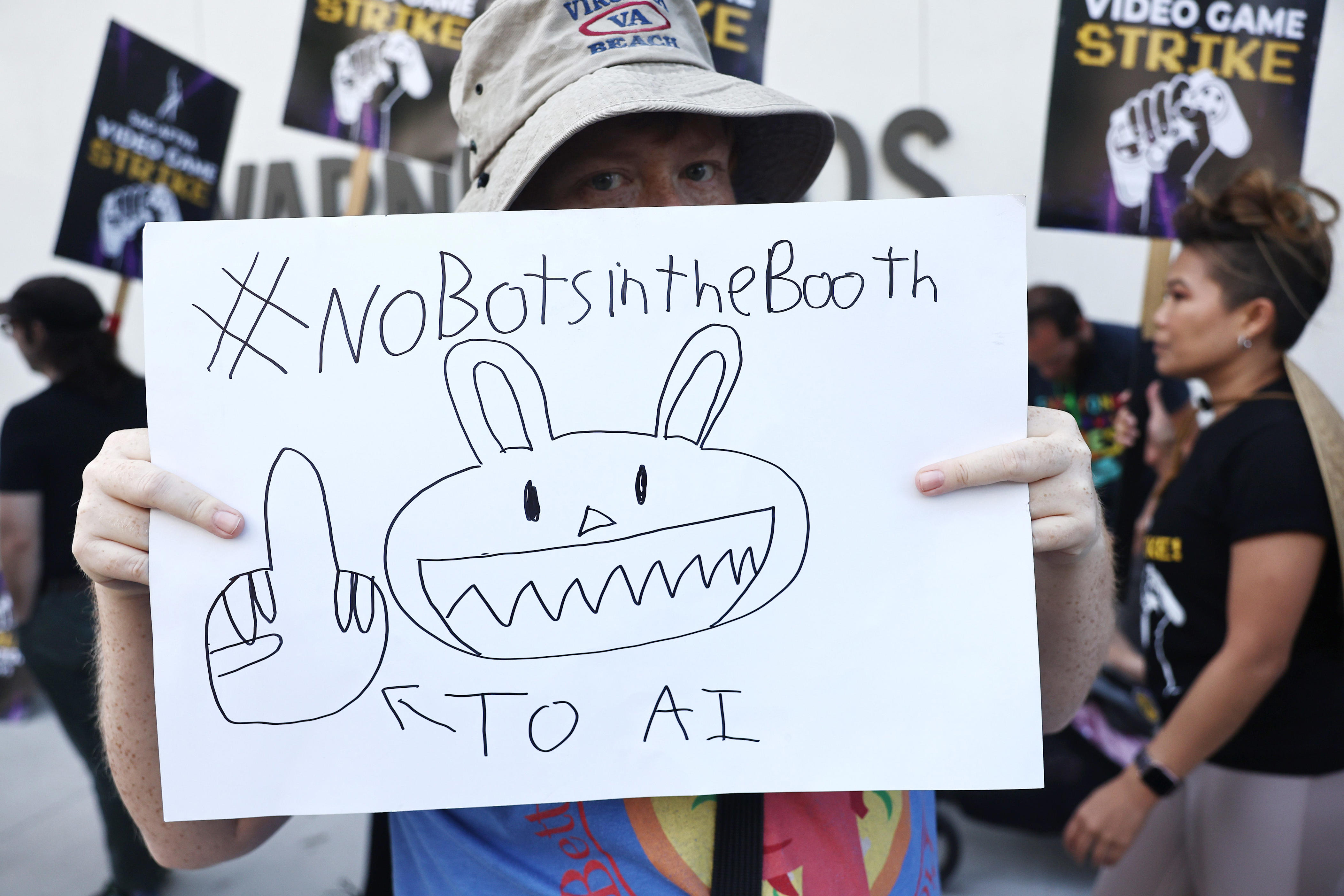 ‘Don’t put a bot in the booth’: Video game actors picket against AI ...