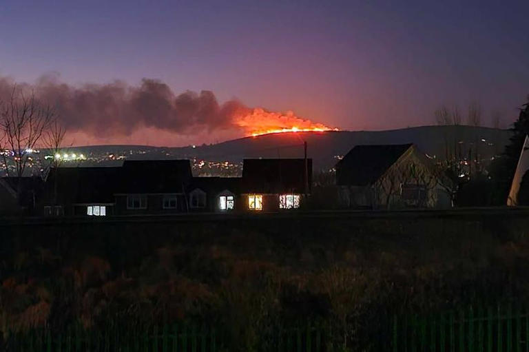 Huge mountain fire seen for miles in Swansea