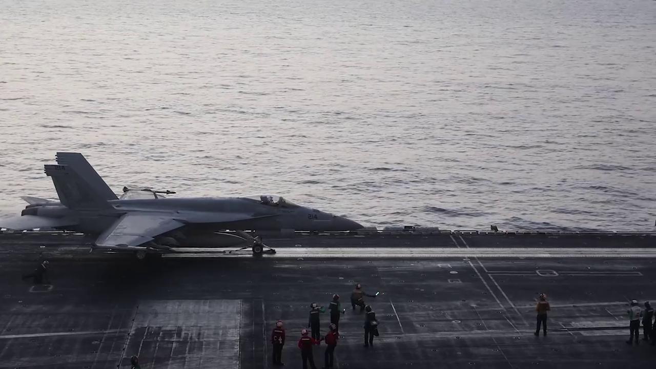 Fighter jets take off from USS Harry S. Truman aircraft carrier