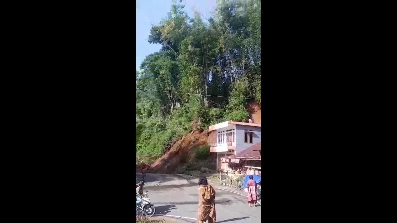 Landslide crashes down hillside next to homes in Indonesia