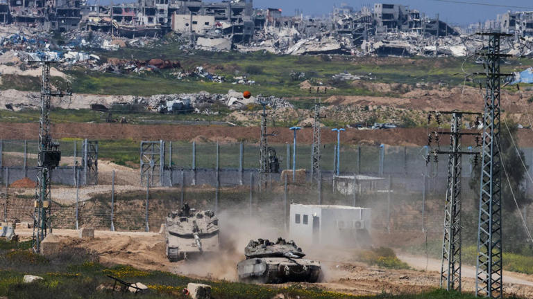 At least 20 killed overnight in Gaza as massive strikes continue At least 20 killed overnight in Gaza as massive strikes continue
