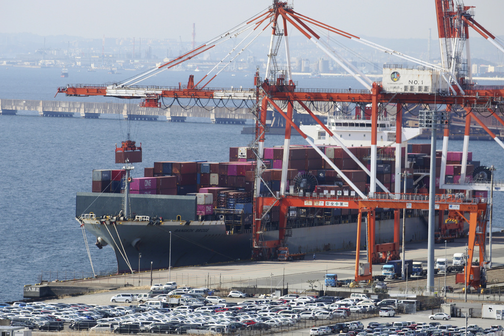 Japan's exports surge in February, leaving a trade surplus as worries ...