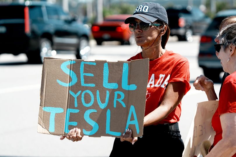 War on Tesla: Showrooms vandalized and cars set on fire as anti-Musk ...