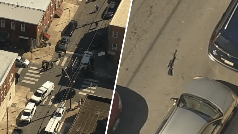 Police surround South Philly intersection as rifle rests in roadway