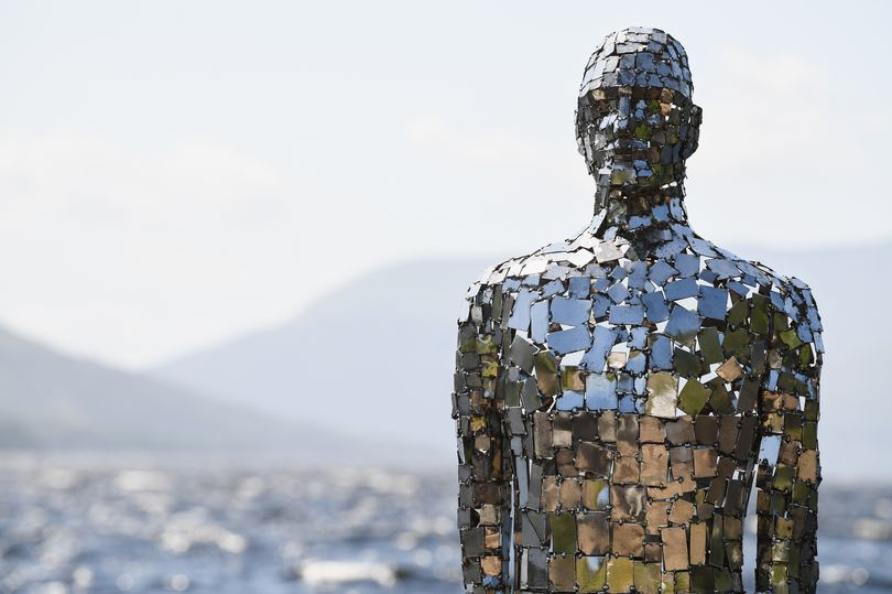Iconic Scottish 'Mirror Man' loch statue returns after eight years