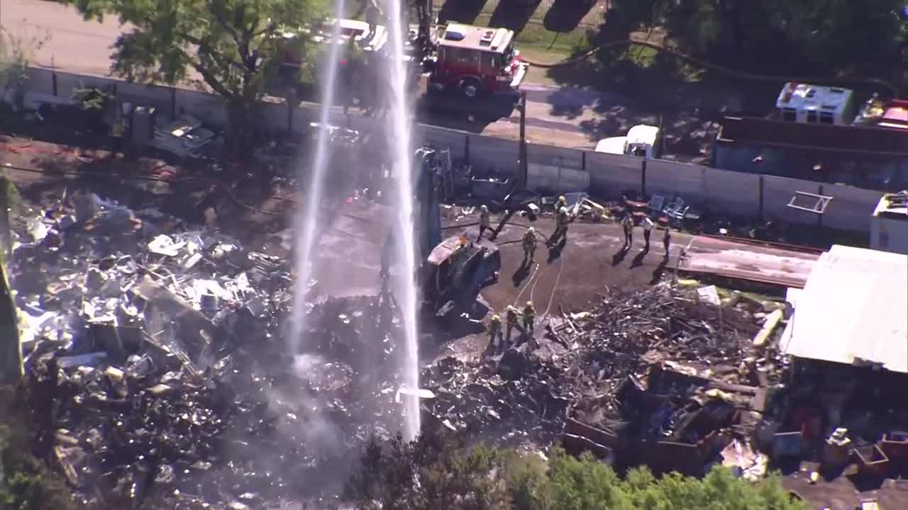 Junkyard fire sends smoke into Tampa sky