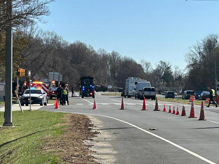 Man with apparent handgun outside CIA HQ in custody after barricade ...