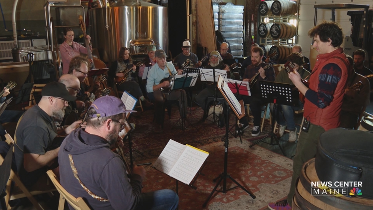 This Maine orchestra has 20 members. All except one play the same ...