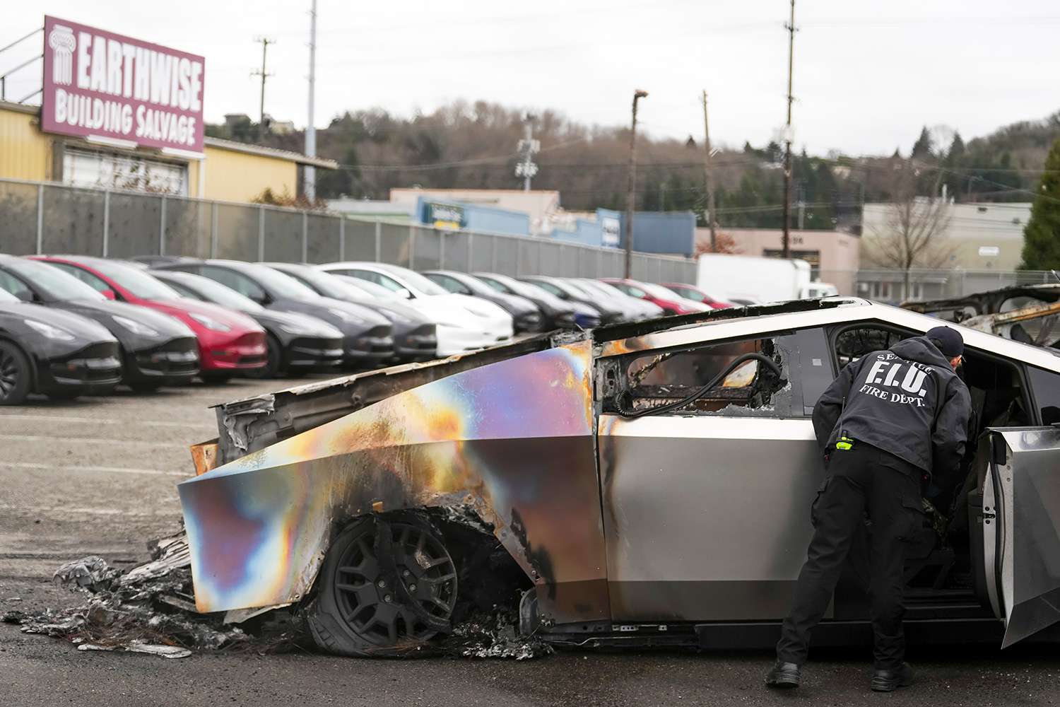 FBI Investigating Tesla Dealerships Targeted in Molotov Cocktail ...