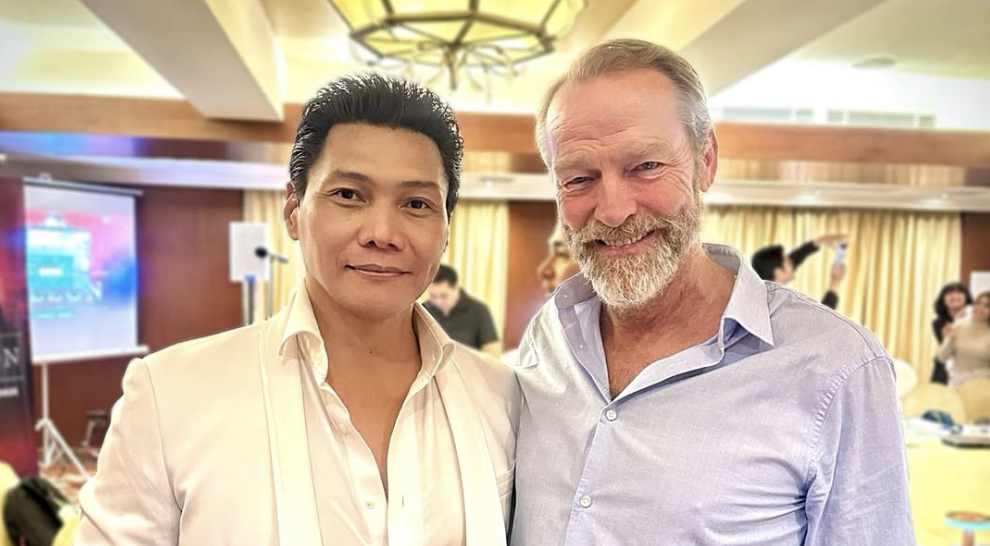 'Quezon' actors Mon Confiado and Iain Glen pose for a photo