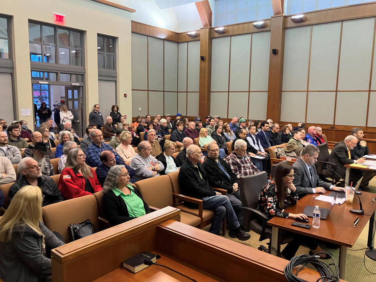 Anxious Denville residents pack meeting to hear details of 90-foot-high ...