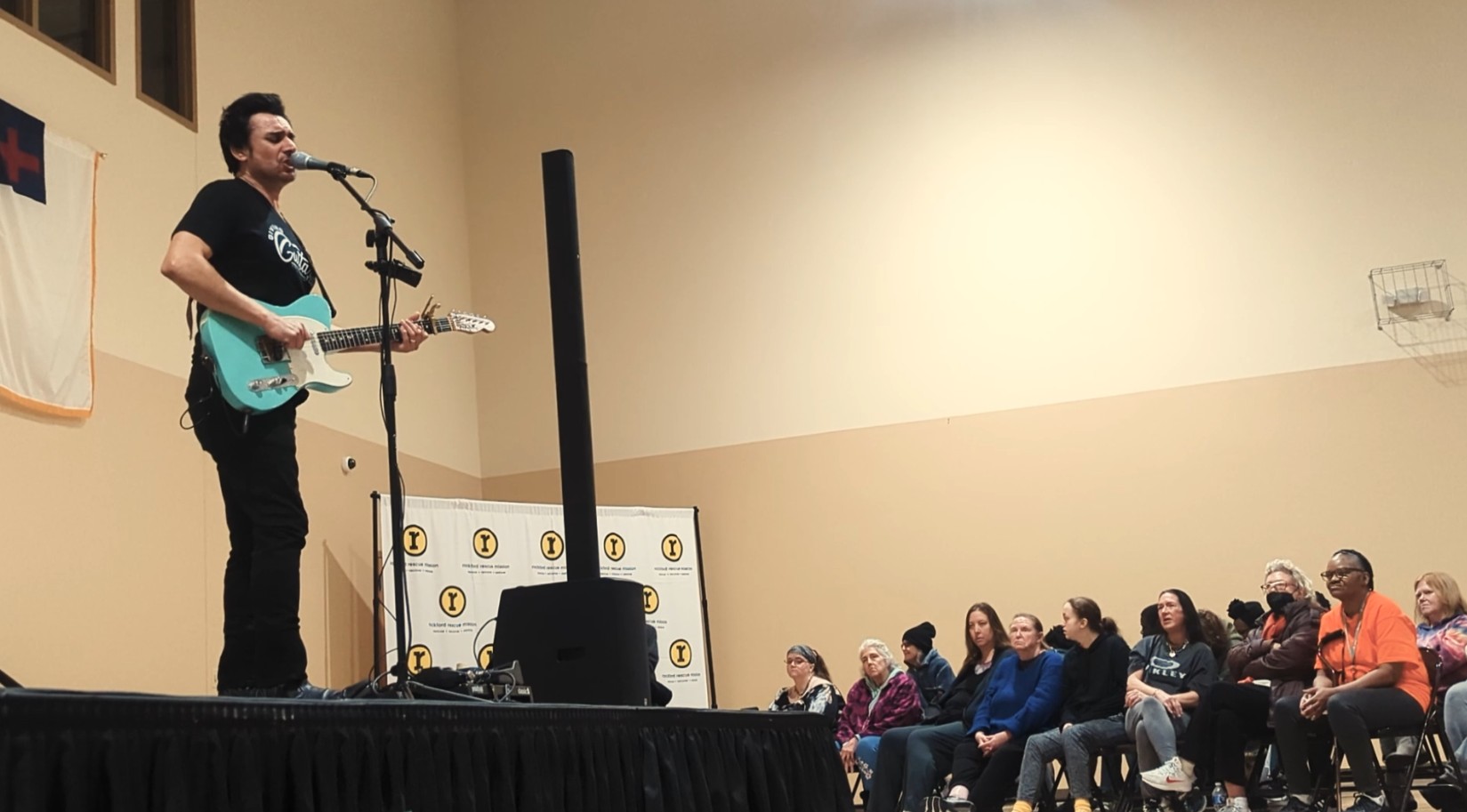 Steven Cade performs "Big Picture Thinker" at the Rockford Rescue Mission