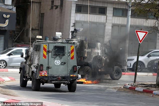 Israel threatens Hamas with 'total destruction' and pounds Gaza