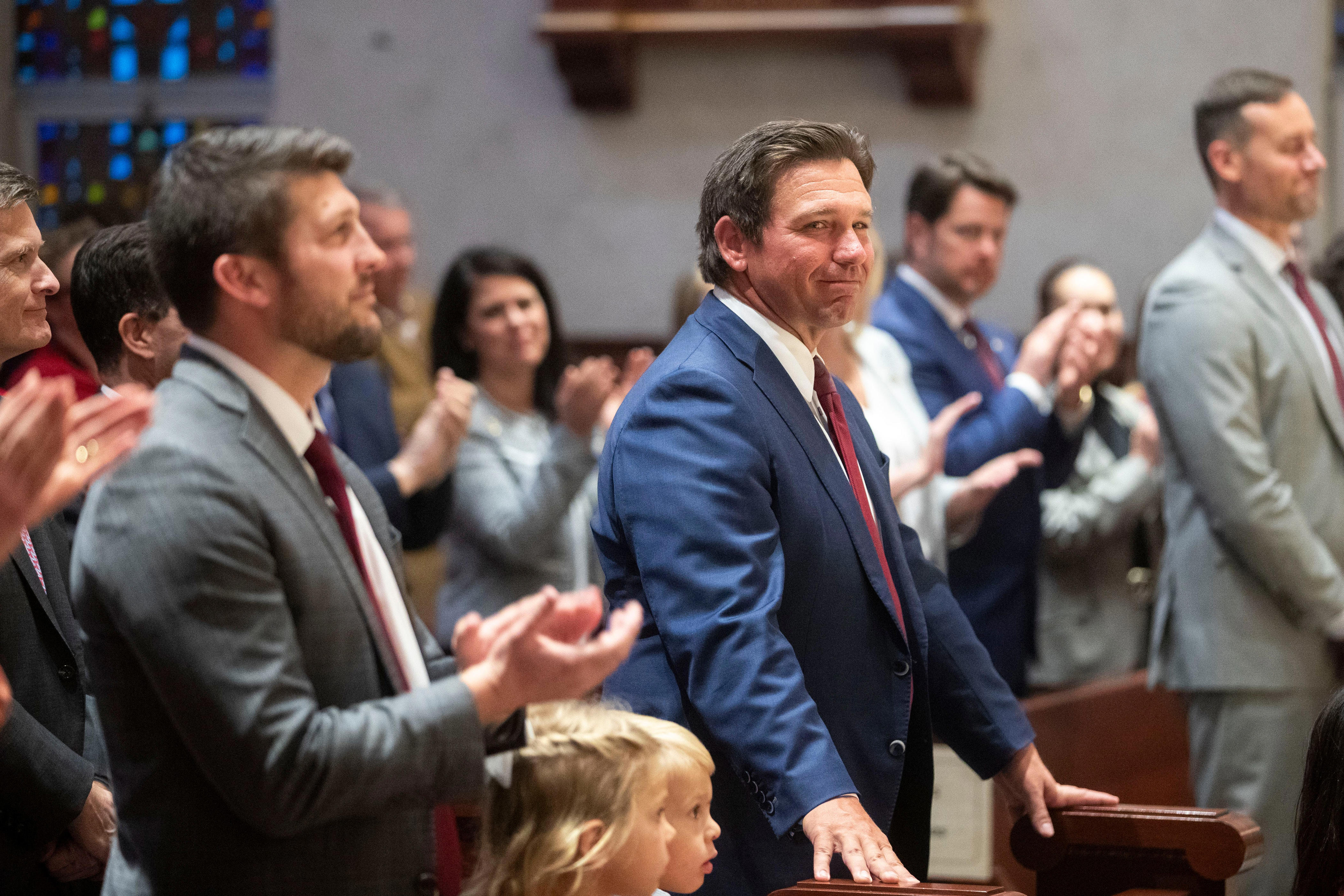 Gov. DeSantis applauded at Catholic service for defeating Florida ...