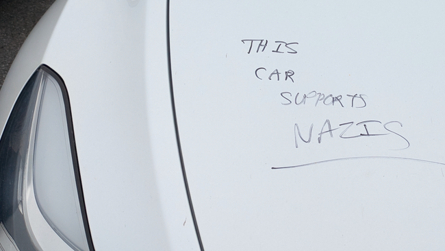'This Car Supports Nazis' Scribbled on Hood of Tesla