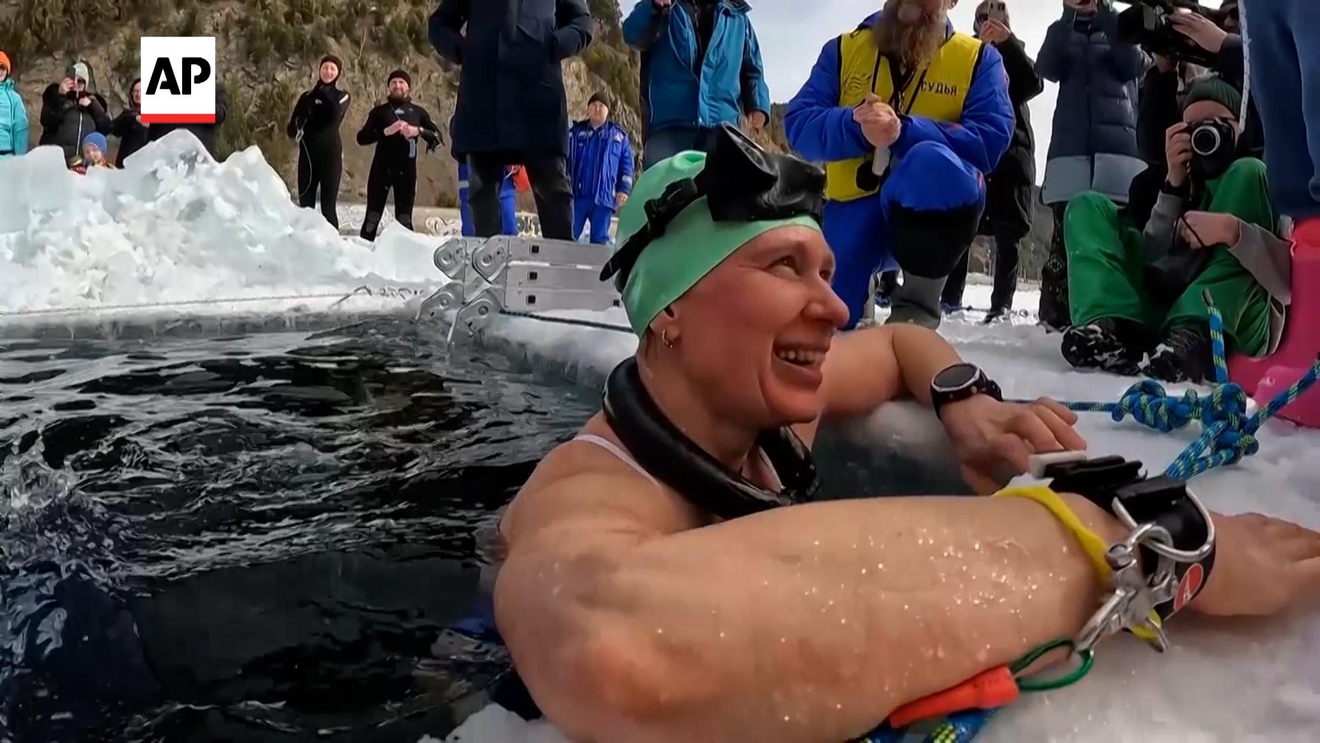 Russian free diver may have set new world record for longest under-ice swim