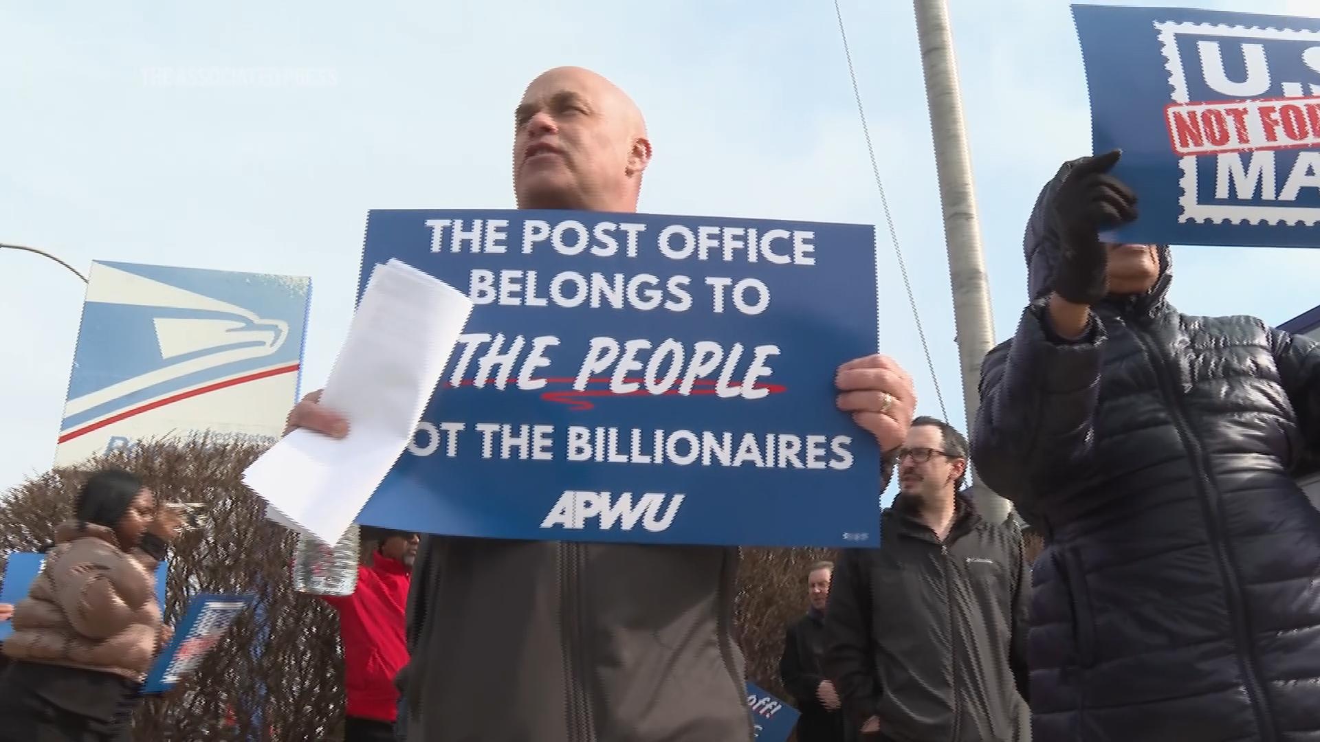 Postal workers in Philadelphia protest after Trump suggests he might ...