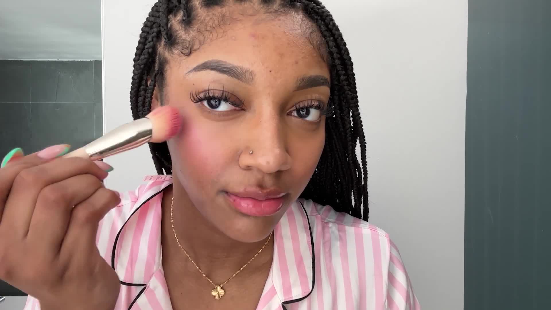 Angel Reese Reveals the K-Beauty Staple She Keeps on the Bench During ...