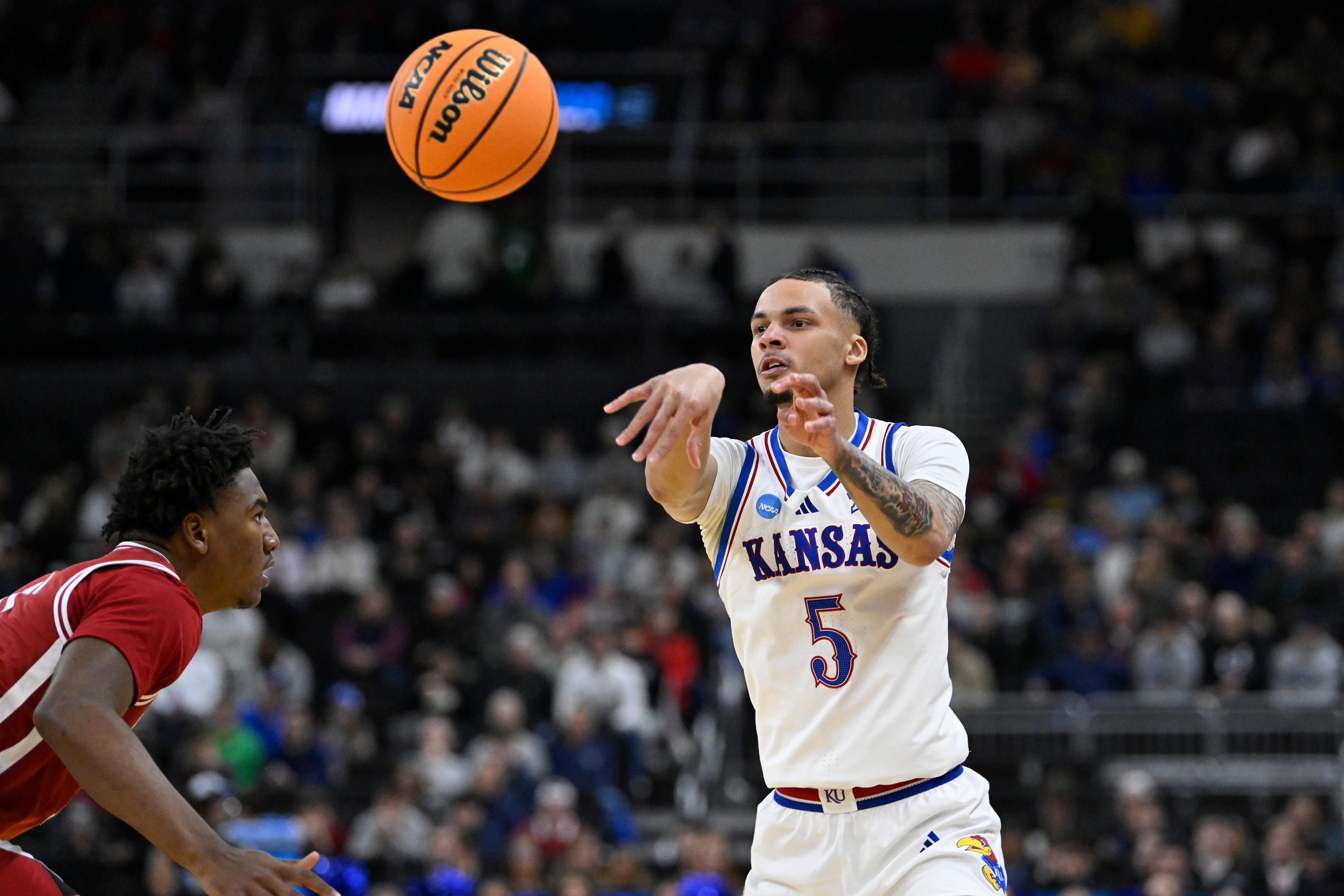 It may be ‘a slim chance,’ but Kansas basketball’s Zeke Mayo plans to ...