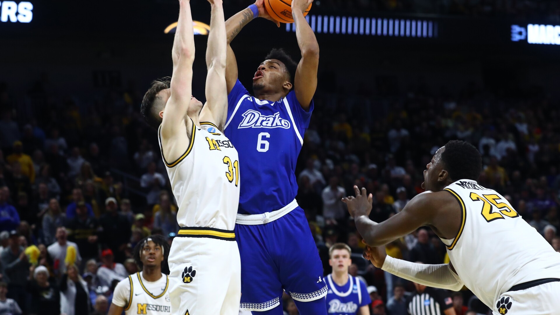 No. 11 seed Drake holds on after blowing big lead and beats Missouri 67 ...
