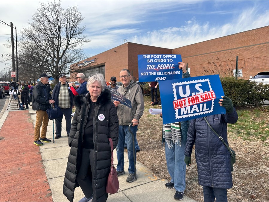 USPS workers rally against potential DOGE cuts