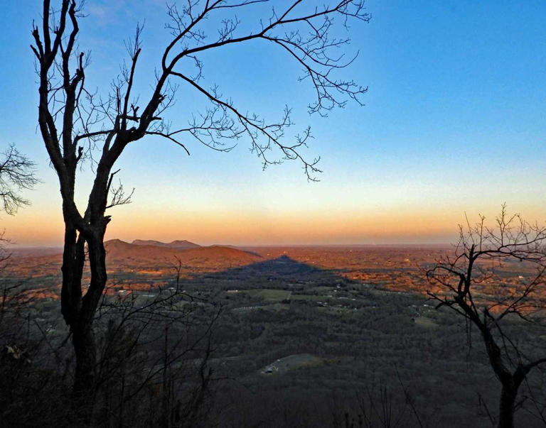 Why a mysterious pyramid shadow casts from Pilot Mountain in spring