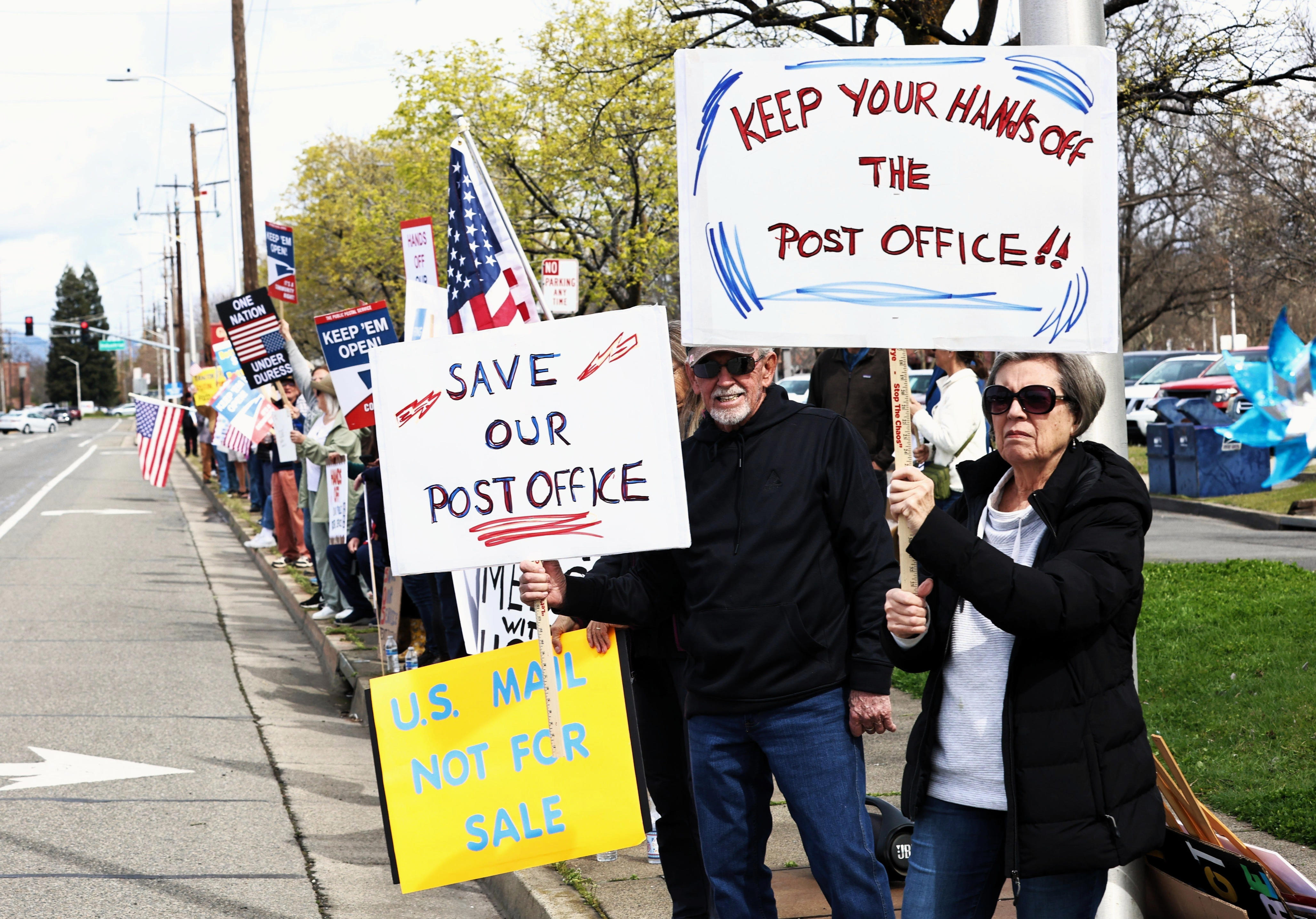 'They're threatening your post office again.' USPS protest in Redding ...