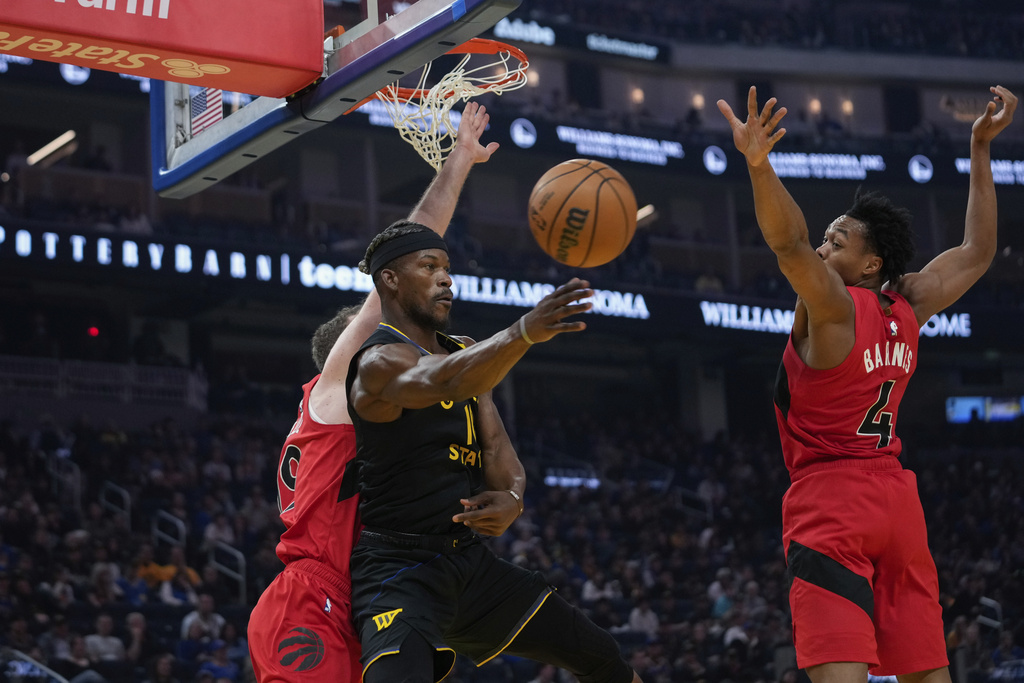 Butler scores 18, but Curry injured in Warriors 117-114 win over Raptors