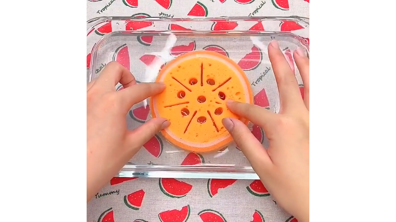 Satisfying Squeezing Orange Shaped Foam With Bubbles