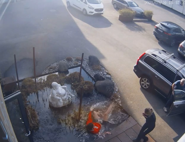 Guy Falls Into Fish Pond While Waving Goodbye to Family