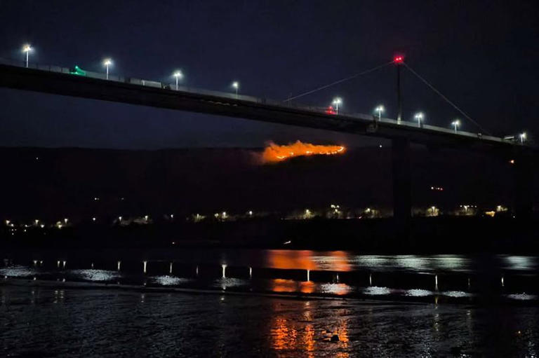 Dramatic drone footage captures huge wildfire burning above Glasgow as ...