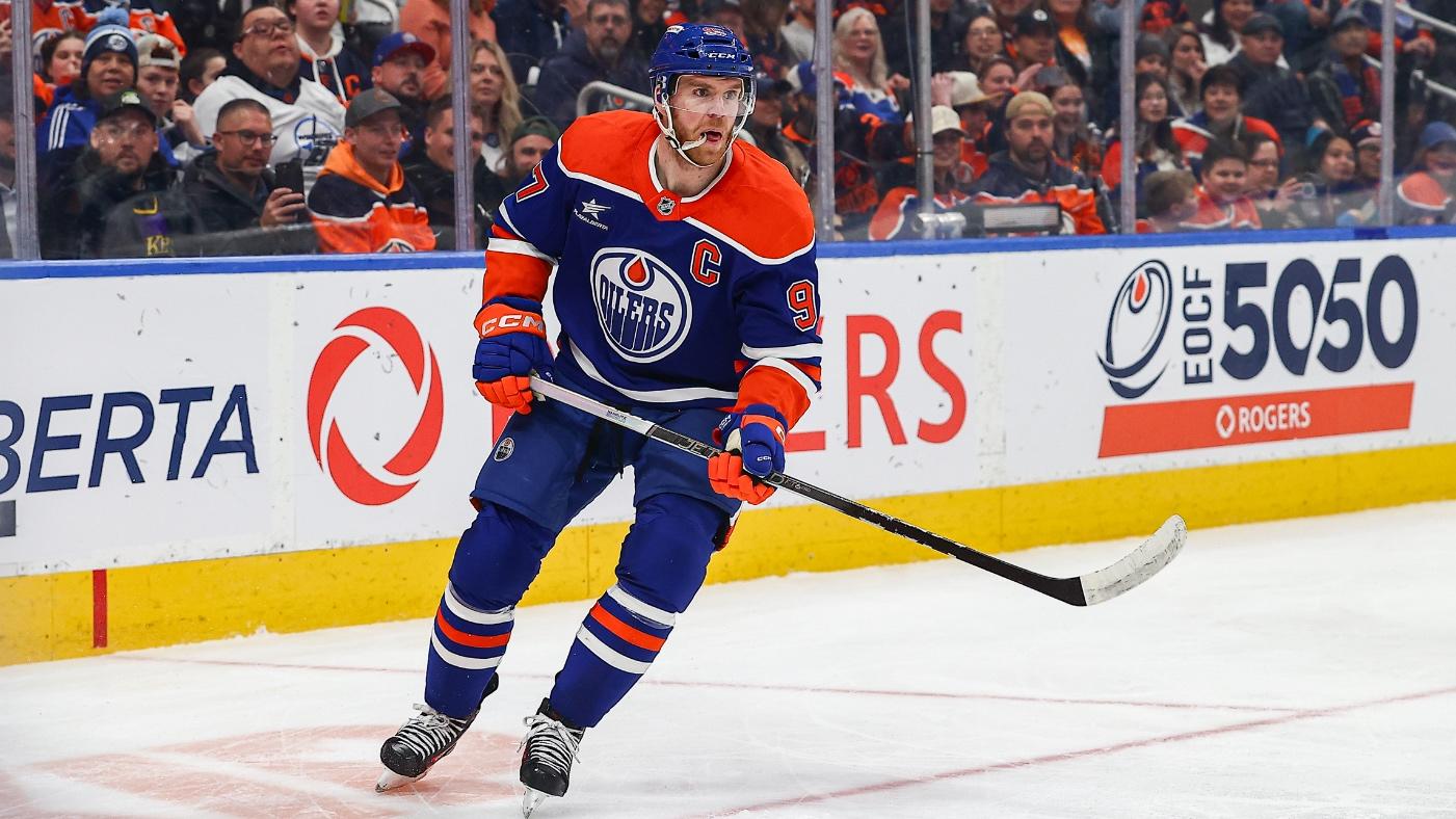 Connor McDavid exits Oilers' 4-3 overtime loss to Jets with lower-body ...