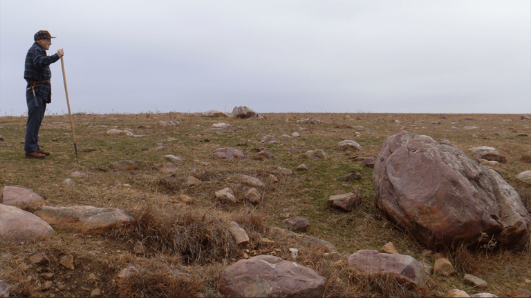 What are the pink mystery rocks scattered across northeast Kansas?