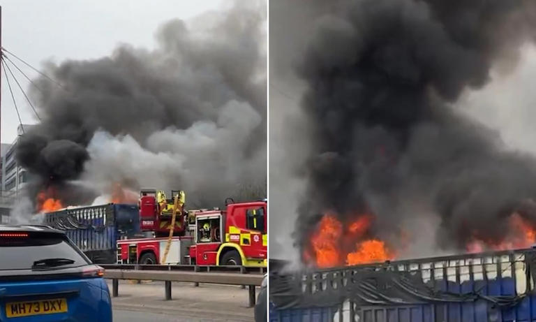 Moment lorry carrying electrical equipment bursts into flames