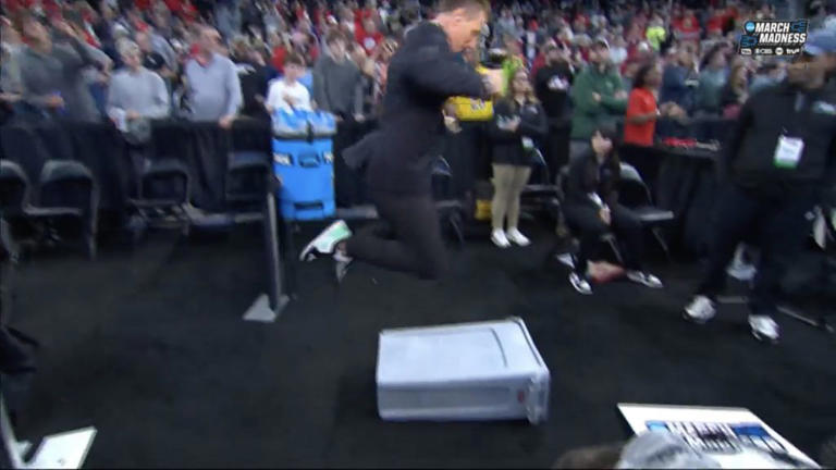 CBS’ Evan Washburn knee drops trash can like a WWE pro
