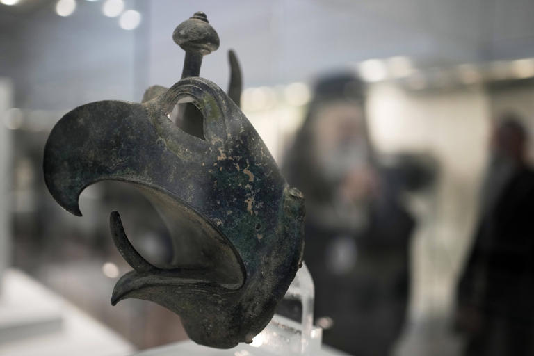 An ancient bronze griffin head is returned to Greece from New York in a ...
