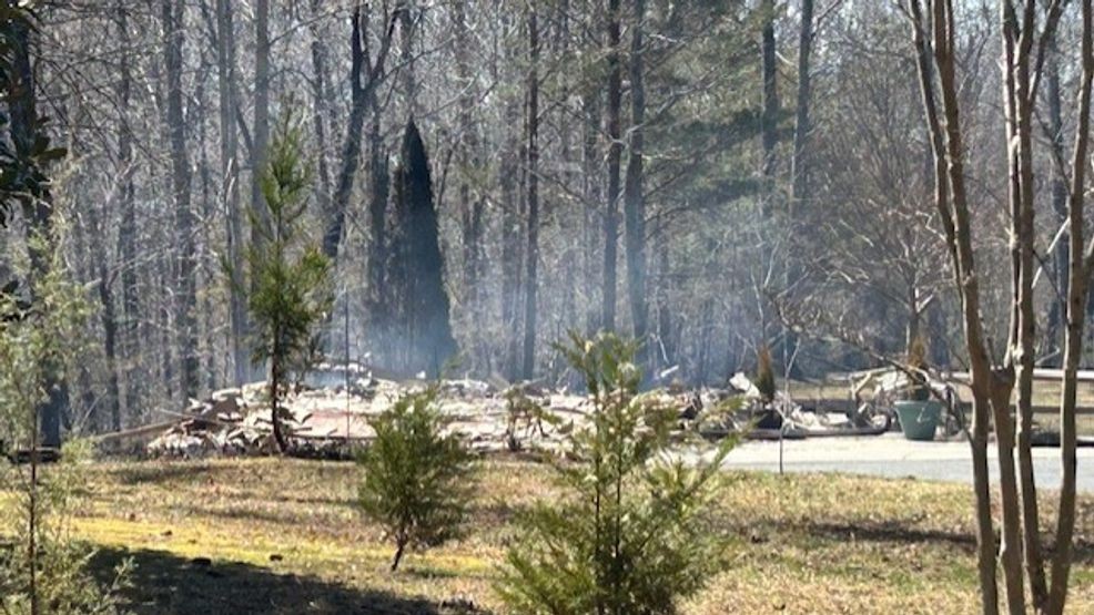 Wildfires ravage Lake Adger community, destroying homes and forcing ...