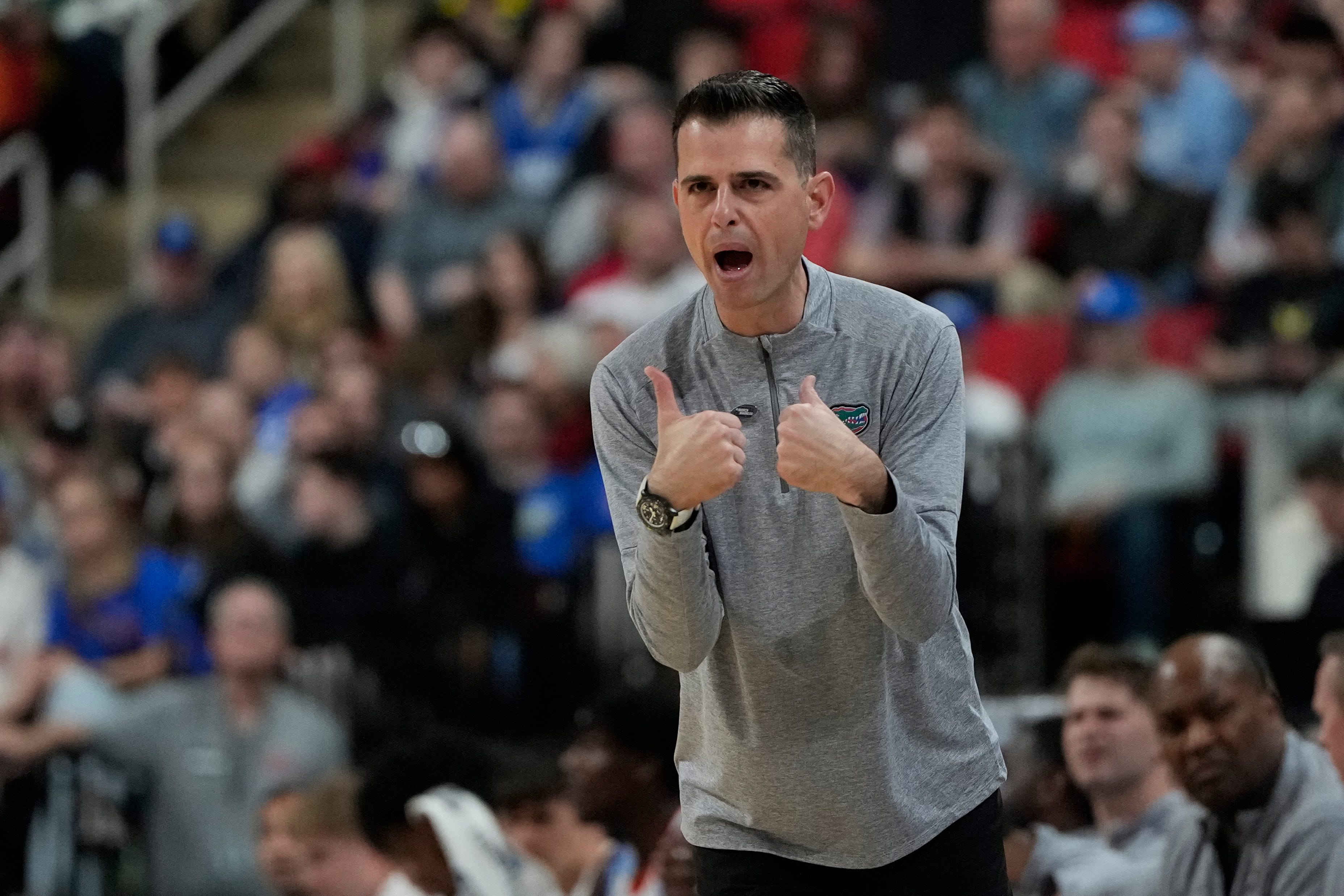 Florida basketball coach joins select list with first NCAA Tournament ...