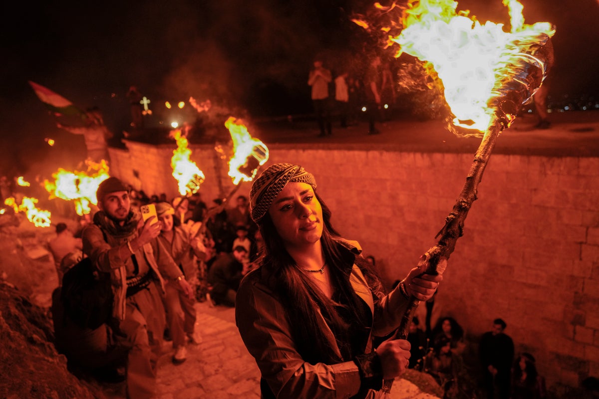Kurds in Iraq and Syria celebrate the Newroz festival of spring at a ...