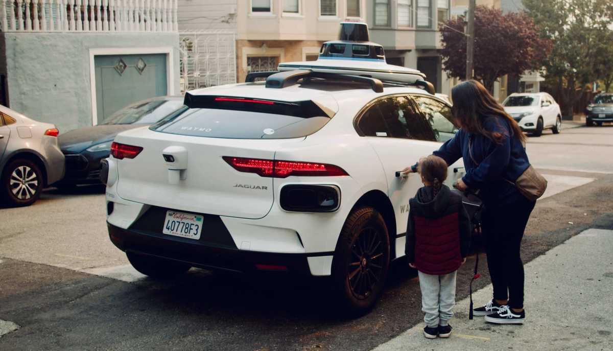 Waymo’s robotaxis can’t close their own doors — so it’s paying people ...
