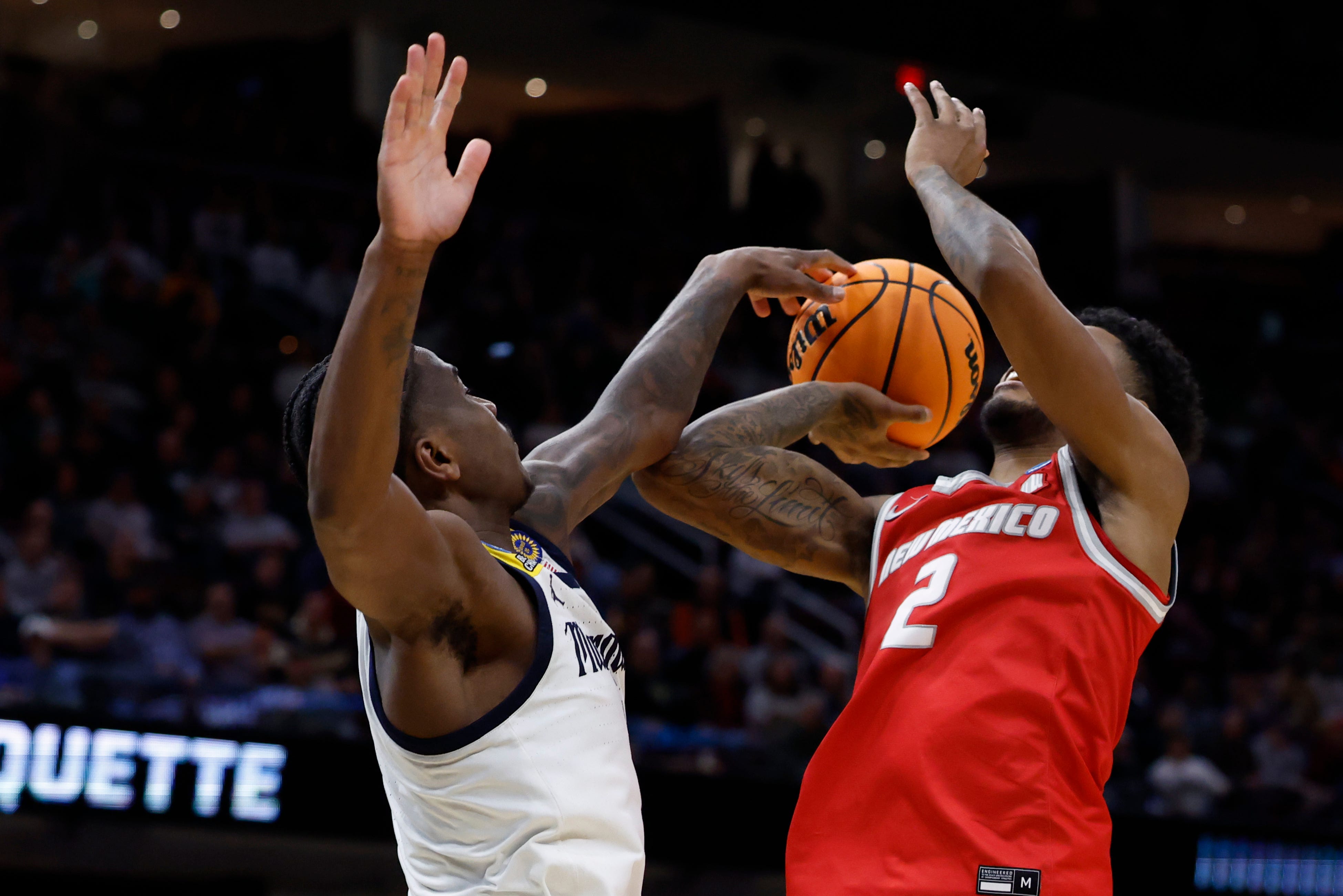 UNM defeats Marquette in first round of 2025 March Madness NCAA ...