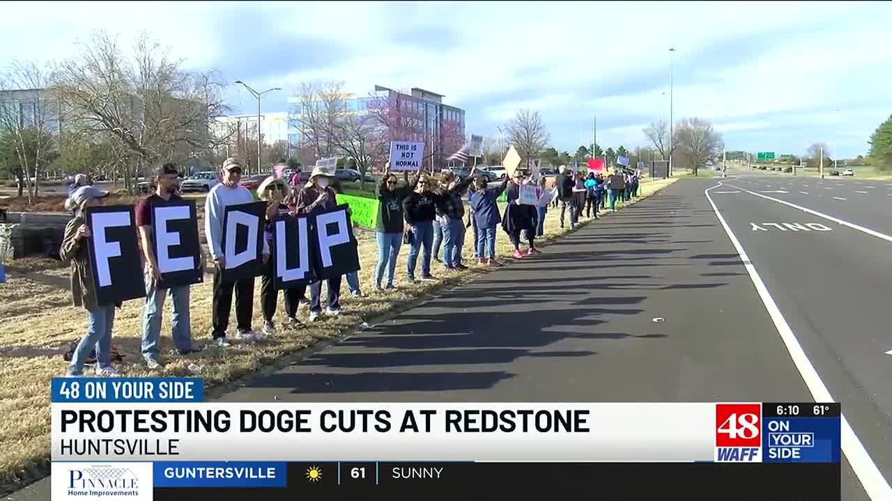 Huntsville group holds protest against DOGE cuts outside Redstone Arsenal